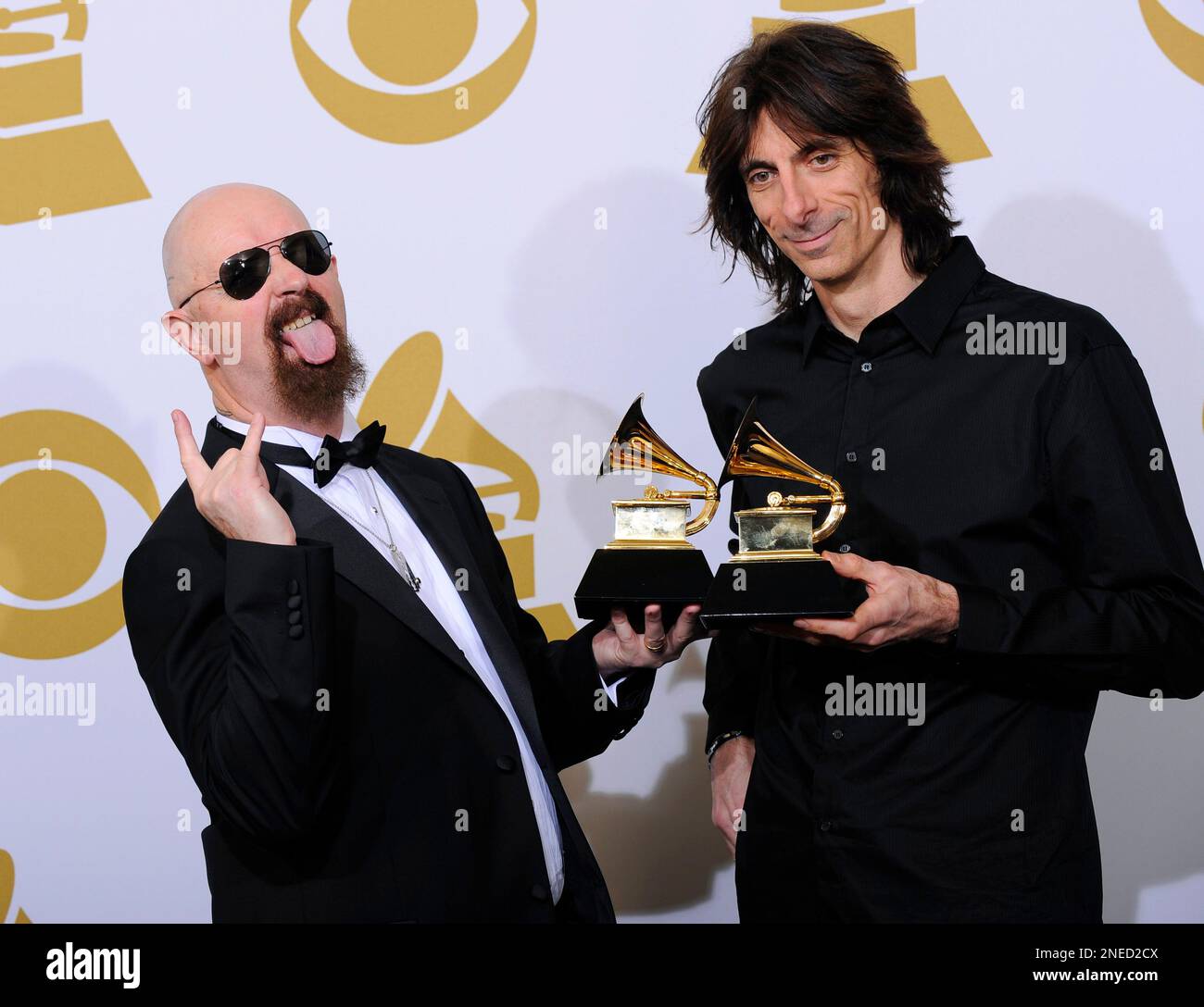 Rob Halford, left and Scott Travis of Judas Priest hold their best ...