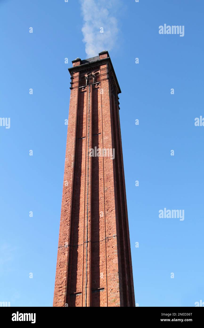 Smoke Rising from a Vintage Brick Built Tall Chimney Stock Photo - Alamy