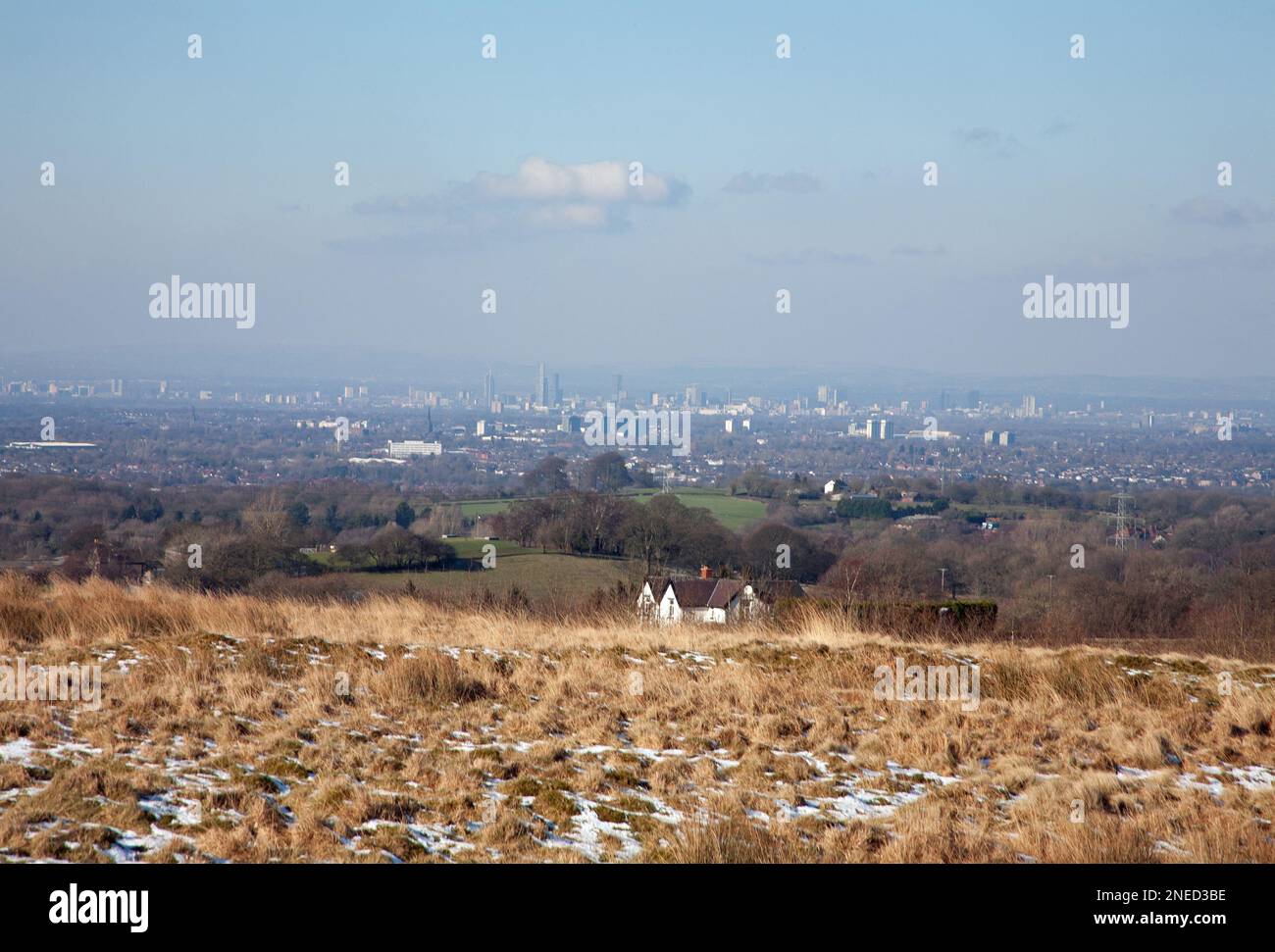 Distant winter view of the City of Manchester from Lyme Park Cheshire ...