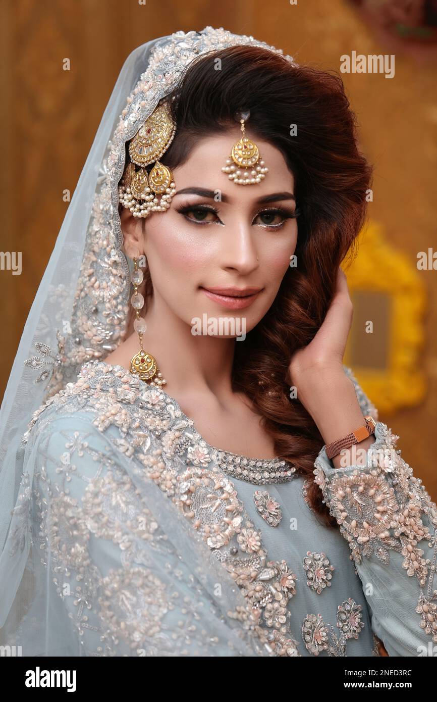 Pakistani. Indian Beautiful bride makeup for saloon shoot Stock Photo ...