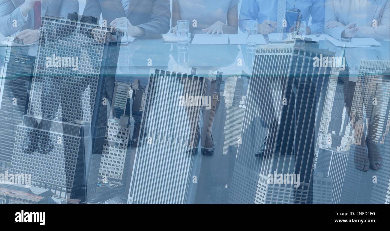 Composition of low section of business people in meeting in office over ...