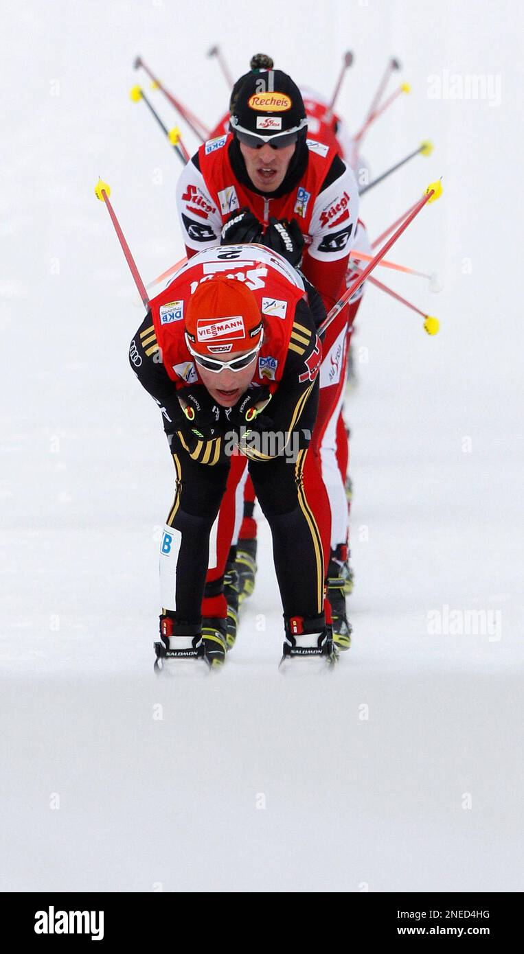 Second placed Eric Frenzel, front, from Germany competes with Austria's ...