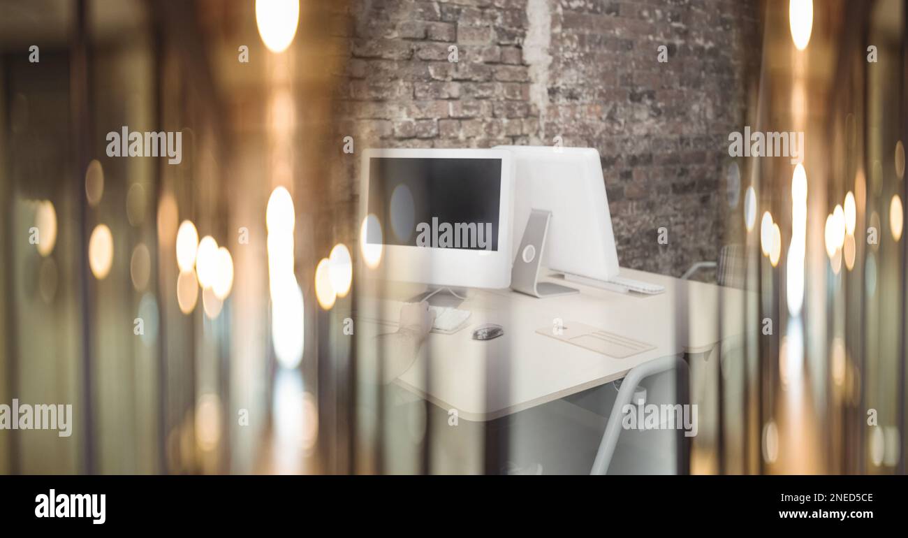 Composition of office interior with computers on desk with double ...