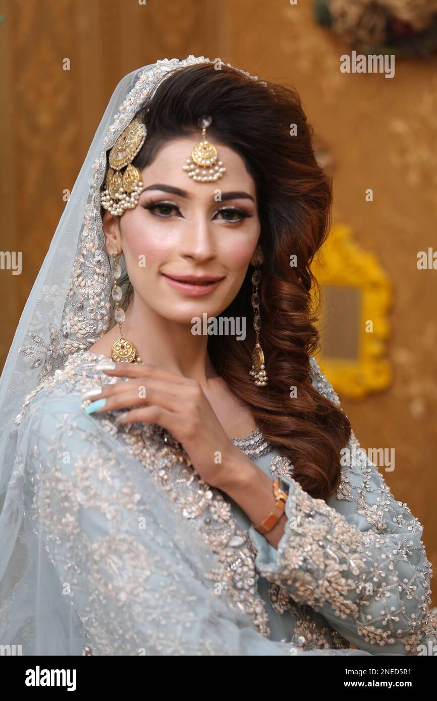 Pakistani. Indian Beautiful bride makeup for saloon shoot Stock Photo ...