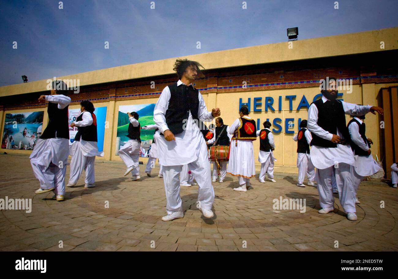 Pakistani tribal people perform a Pashtun's traditional "Mehsud" dance ...