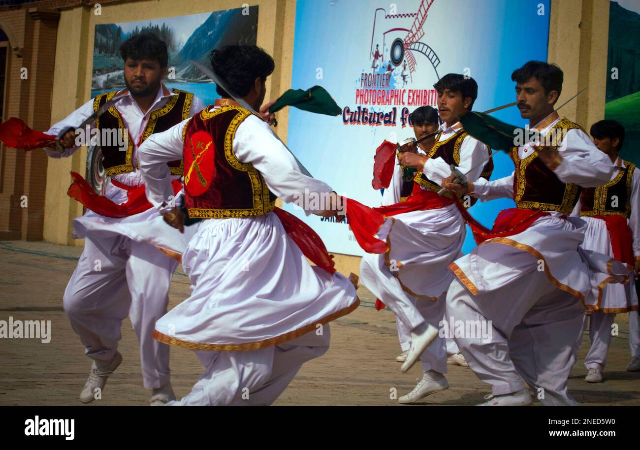 Pakistani tribal people perform a Pashtun's traditional "Khattak" dance ...