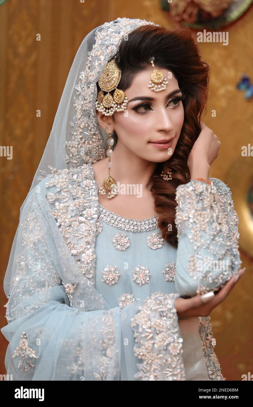 Pakistani. Indian Beautiful bride makeup for saloon shoot Stock Photo ...