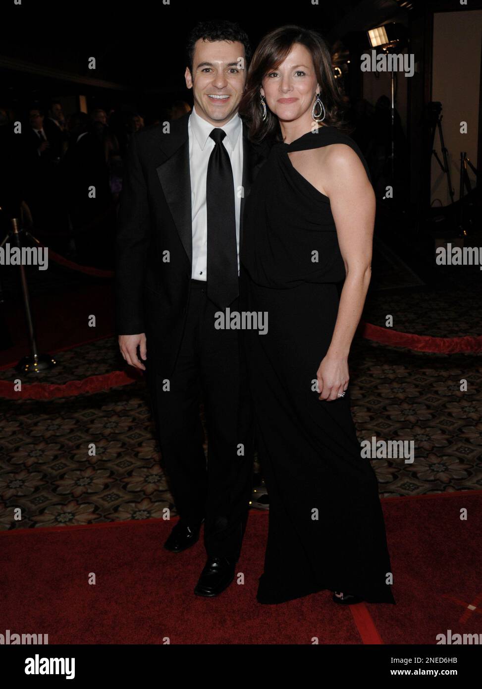 Actor Fred Savage, left, and wife Jennifer Lynn Stone arrive at the ...
