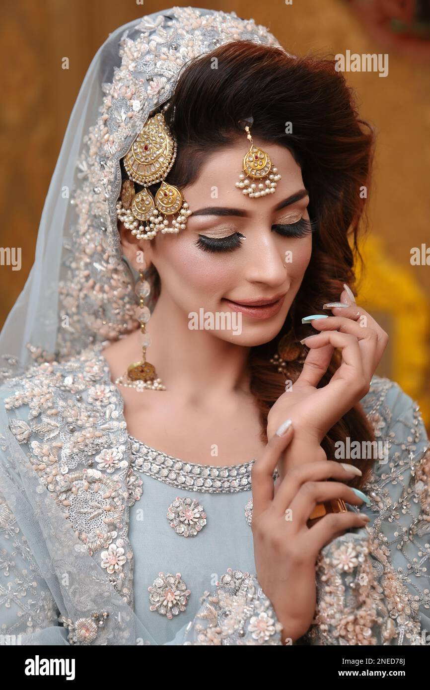 Pakistani. Indian Beautiful bride makeup for saloon shoot Stock Photo ...