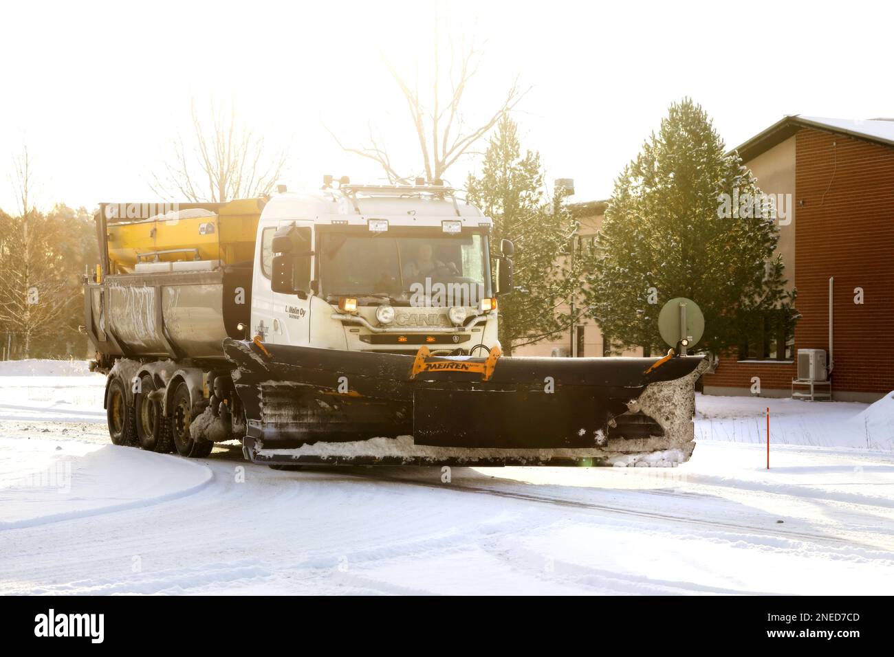 Scania truck equipped with Meiren Snow snow plough clears street after ...