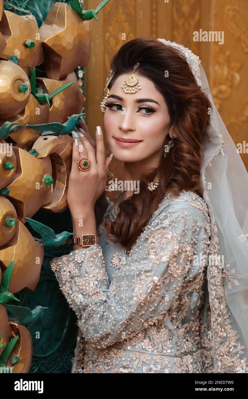 Pakistani. Indian Beautiful bride makeup for saloon shoot Stock Photo ...