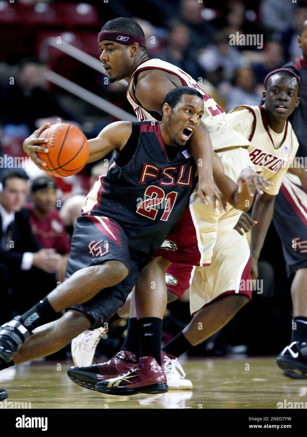 Florida State's Michael Snaer (21) drives past Boston College's Cortney ...