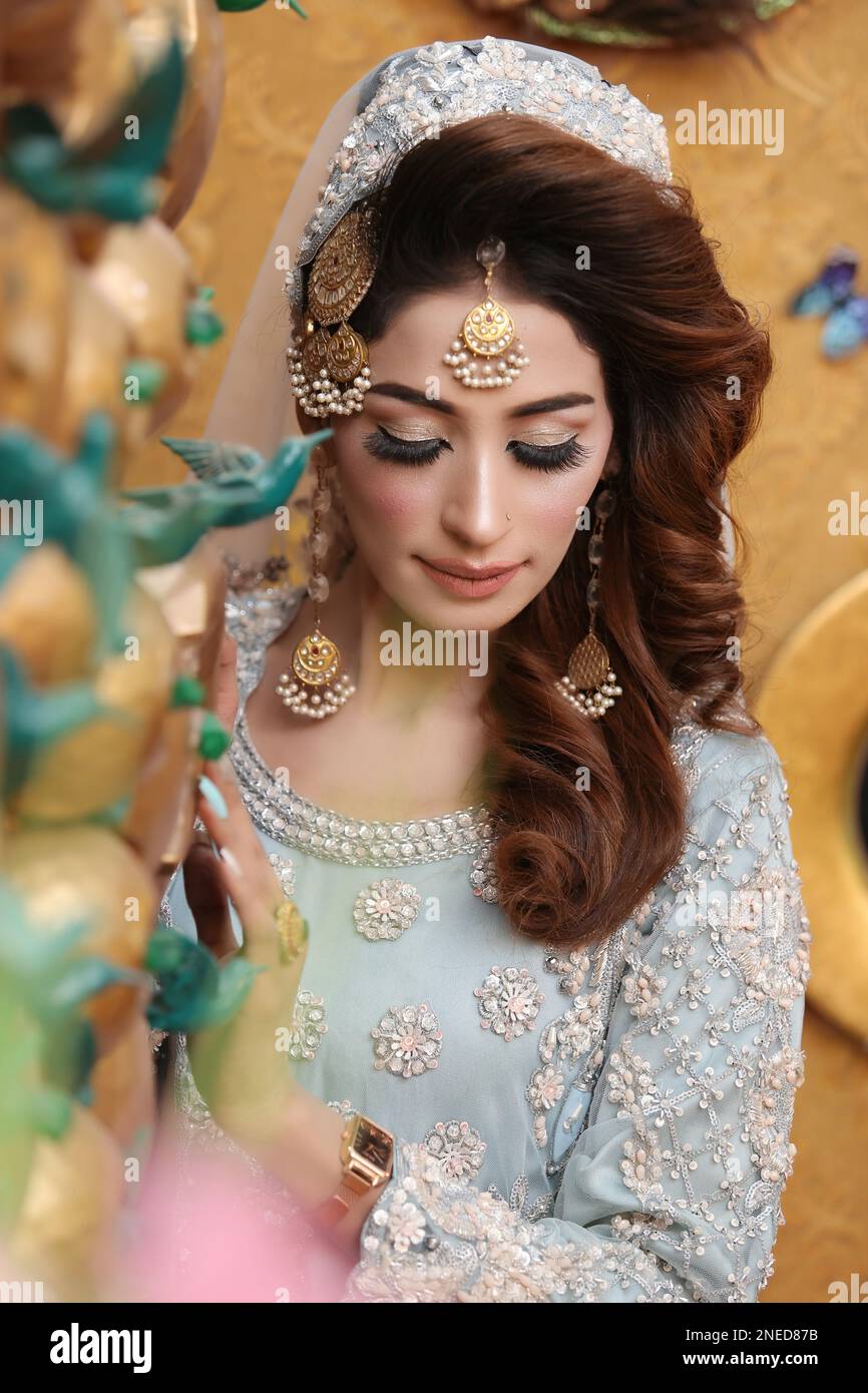 Pakistani. Indian Beautiful bride makeup for saloon shoot Stock Photo ...