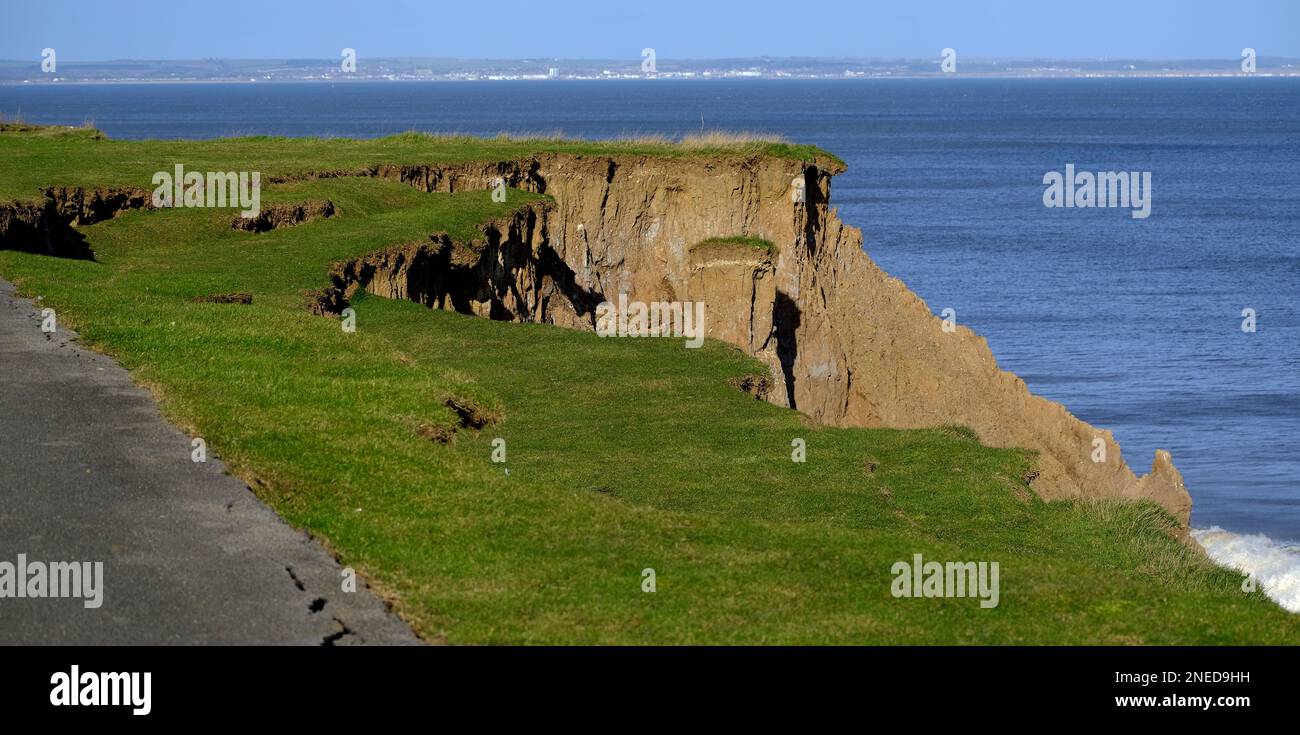 East coast of Yorkshire, UK. Clay cliff erosion. Land loss to the sea Stock Photo - Alamy