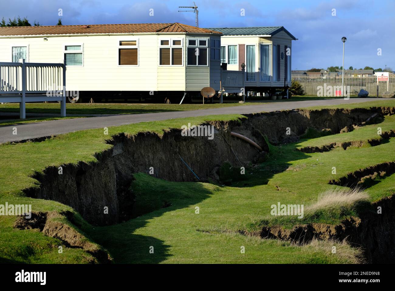 East coast of Yorkshire, UK. Clay cliff erosion. Land loss to the sea ...