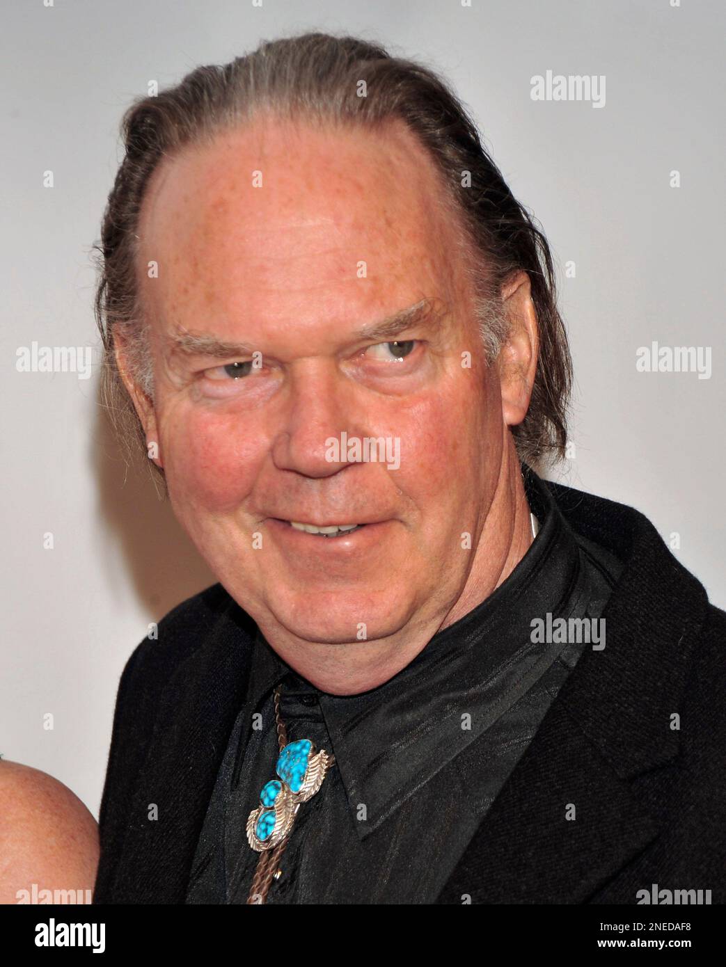 Neil Young arrives at the MusiCares Person of the Year tribute in his ...