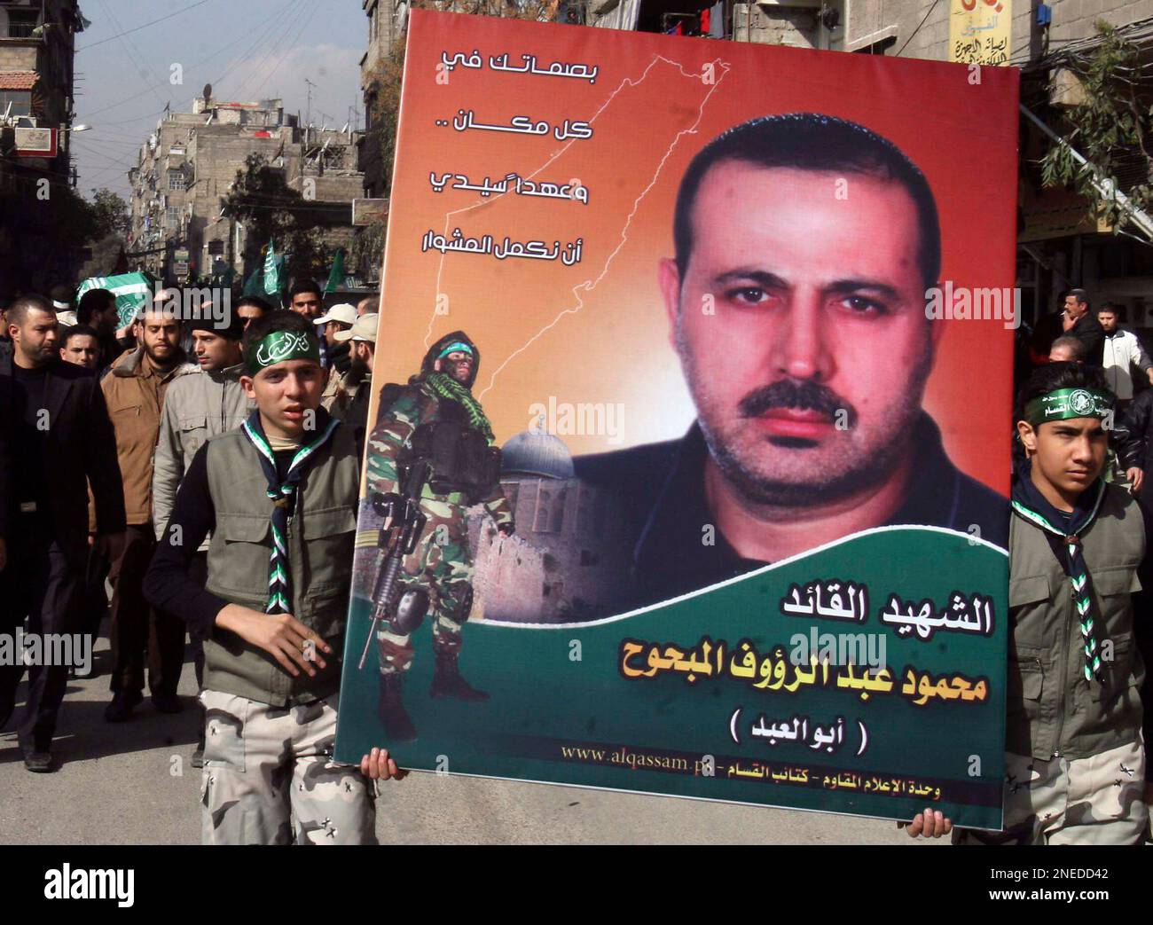 Palestinians carry a picture of Mahmoud al-Mabhouh, one of the founders ...
