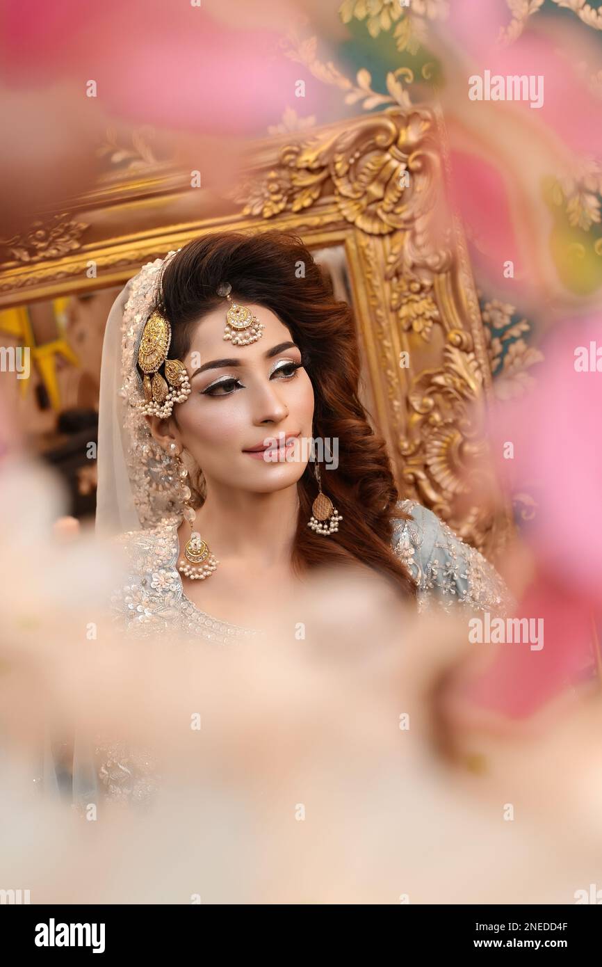 Pakistani. Indian Beautiful bride makeup for saloon shoot Stock Photo ...