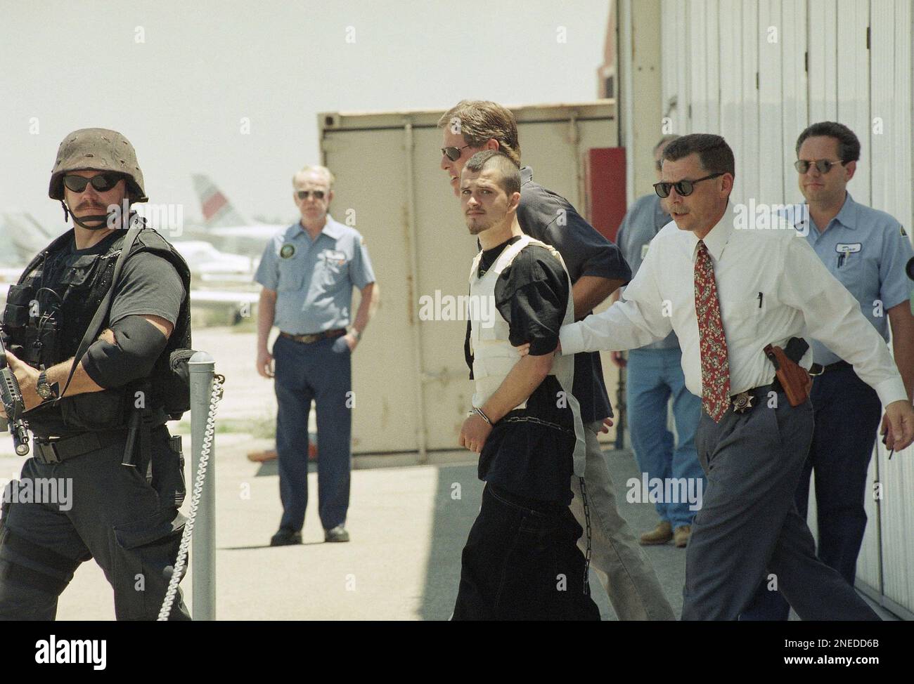 Jesse Fanus, left, the 19-year-old suspect accused in the shotgun death ...