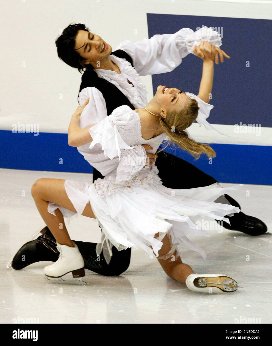 Canada's Kaitlyn Weaver and Andrew Poje perform during the ice dancing ...