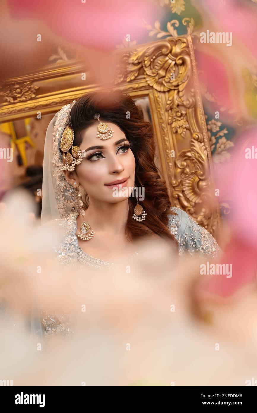 Pakistani. Indian Beautiful bride makeup for saloon shoot Stock Photo ...