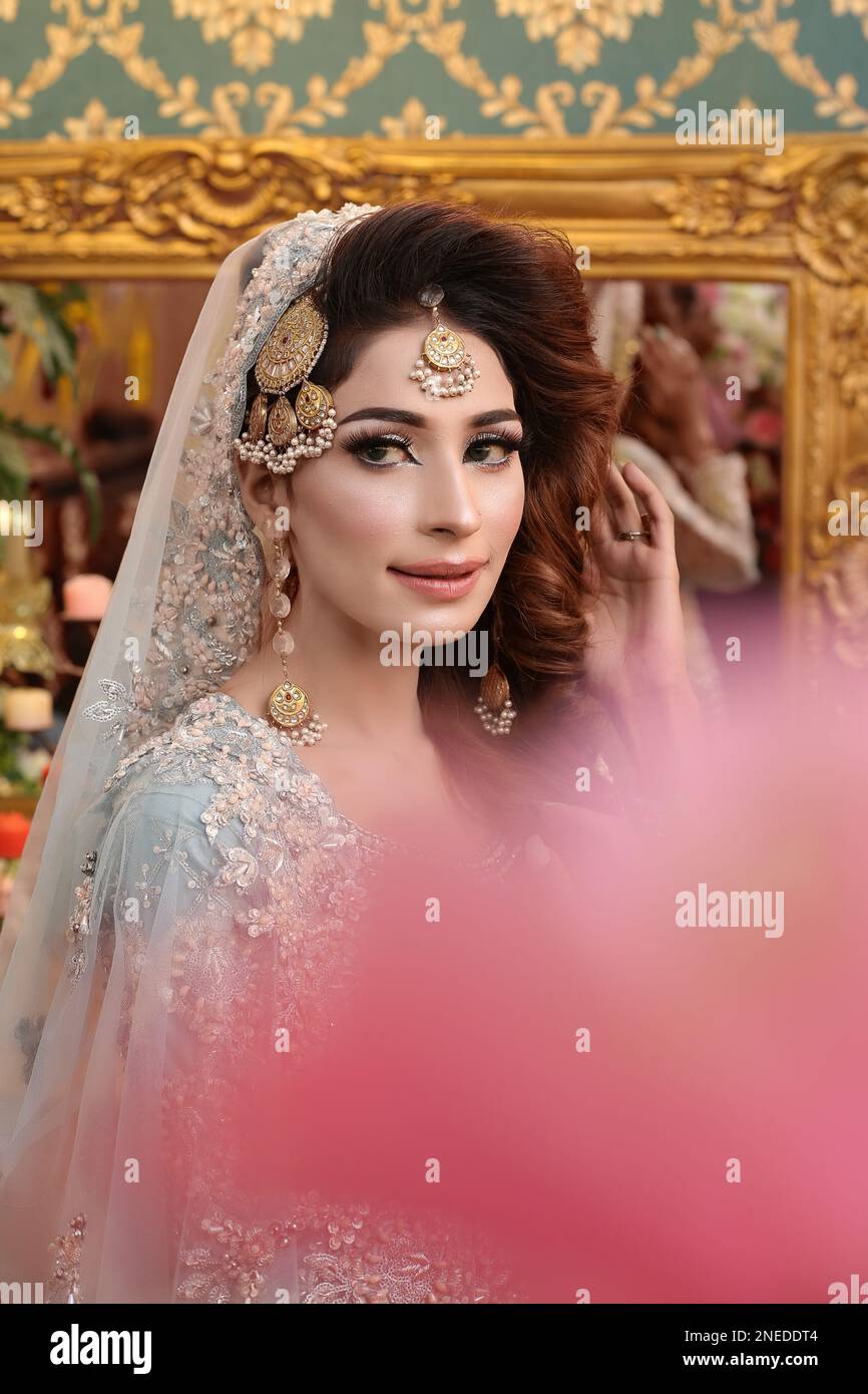 Pakistani. Indian Beautiful bride makeup for saloon shoot Stock Photo ...