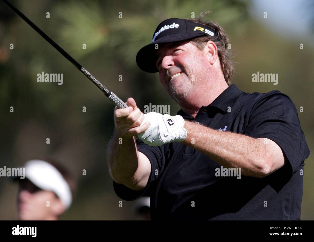 Steve Lowery watches his tee shot on the fifth hole of the North course ...