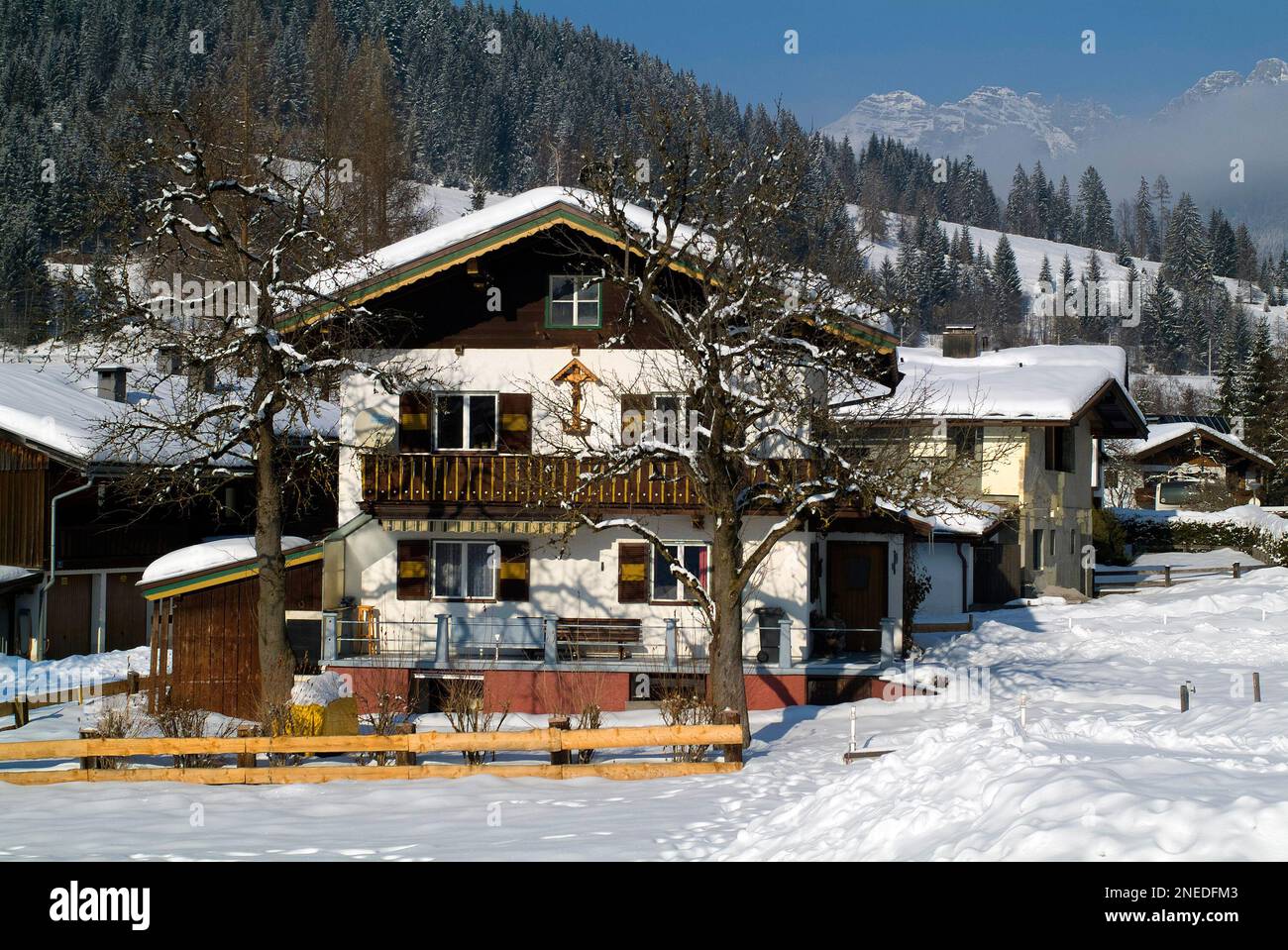 Austria, Tyrol, house of traditional wooden construction in a wintry ...