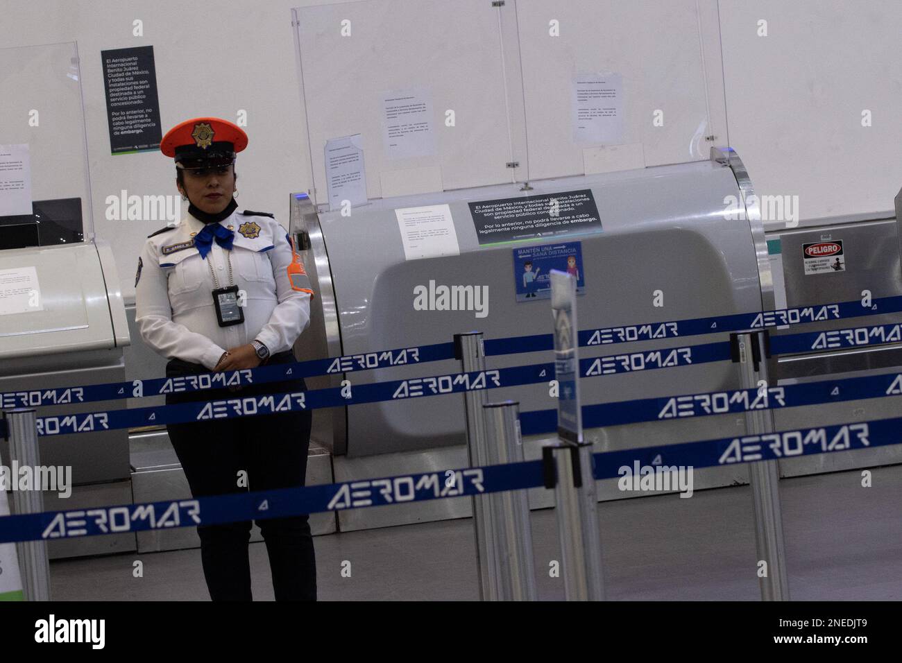 February 15, 2023. Mexico City, Mexico. A women police guards the ...