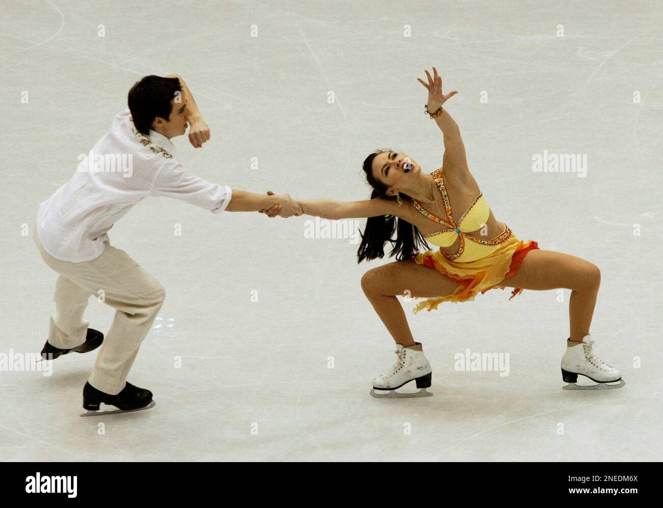Madison Chock and Greg Zuerlein of the U.S., left, perform their ice ...