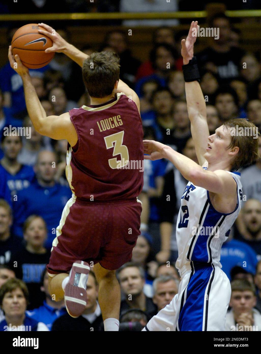 Florida State's Luke Loucks (3) drives into Duke's Kyle Singler (12 ...