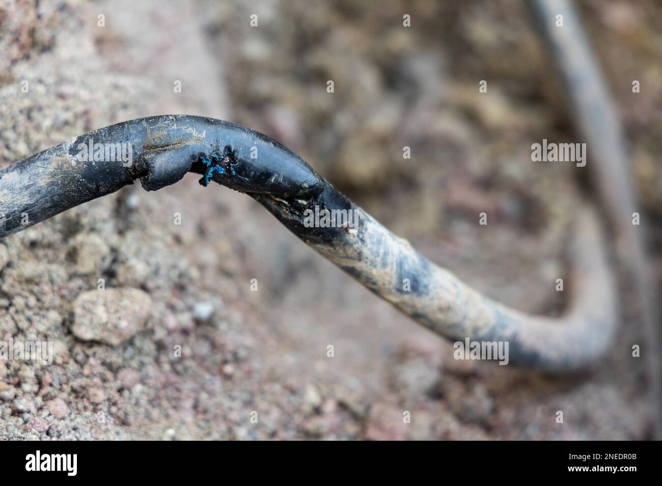 Improper repair of cable after excavator damage Stock Photo - Alamy