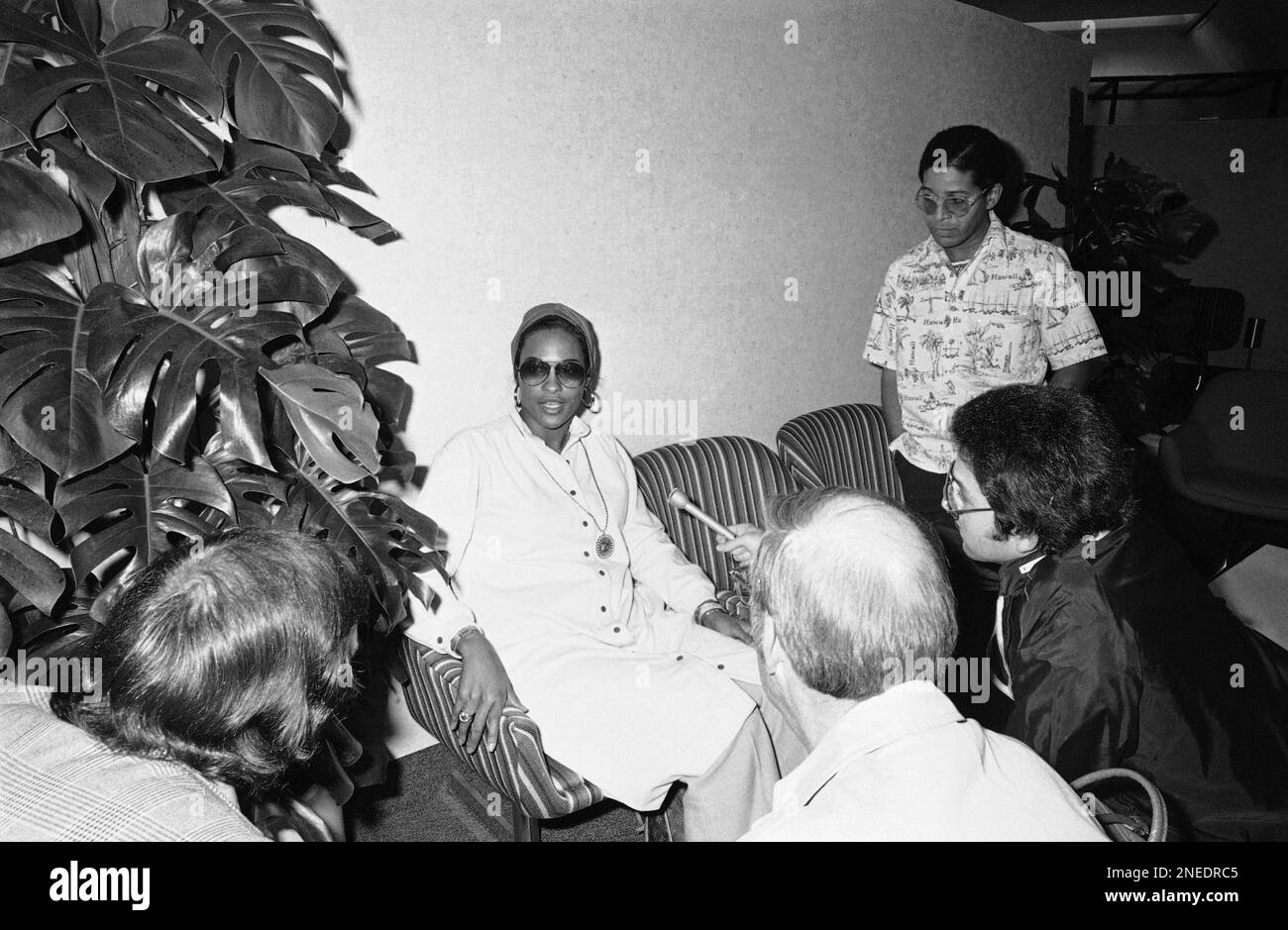 Belinda Ali, wife of heavyweight champion Muhammad Ali, talks with news people after arriving in ...