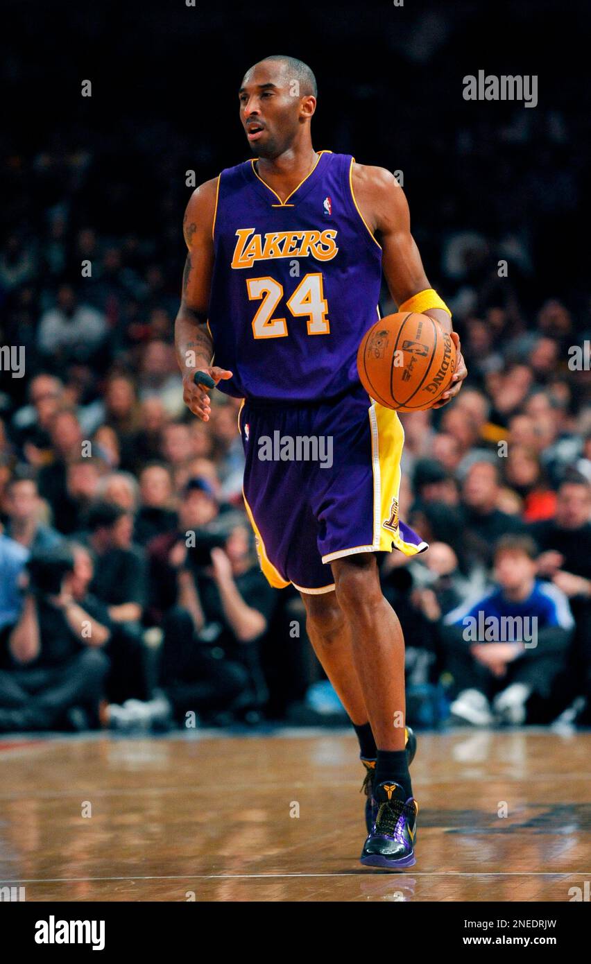 Los Angeles Lakers' Kobe Bryant (24) dribbles down court during an NBA ...