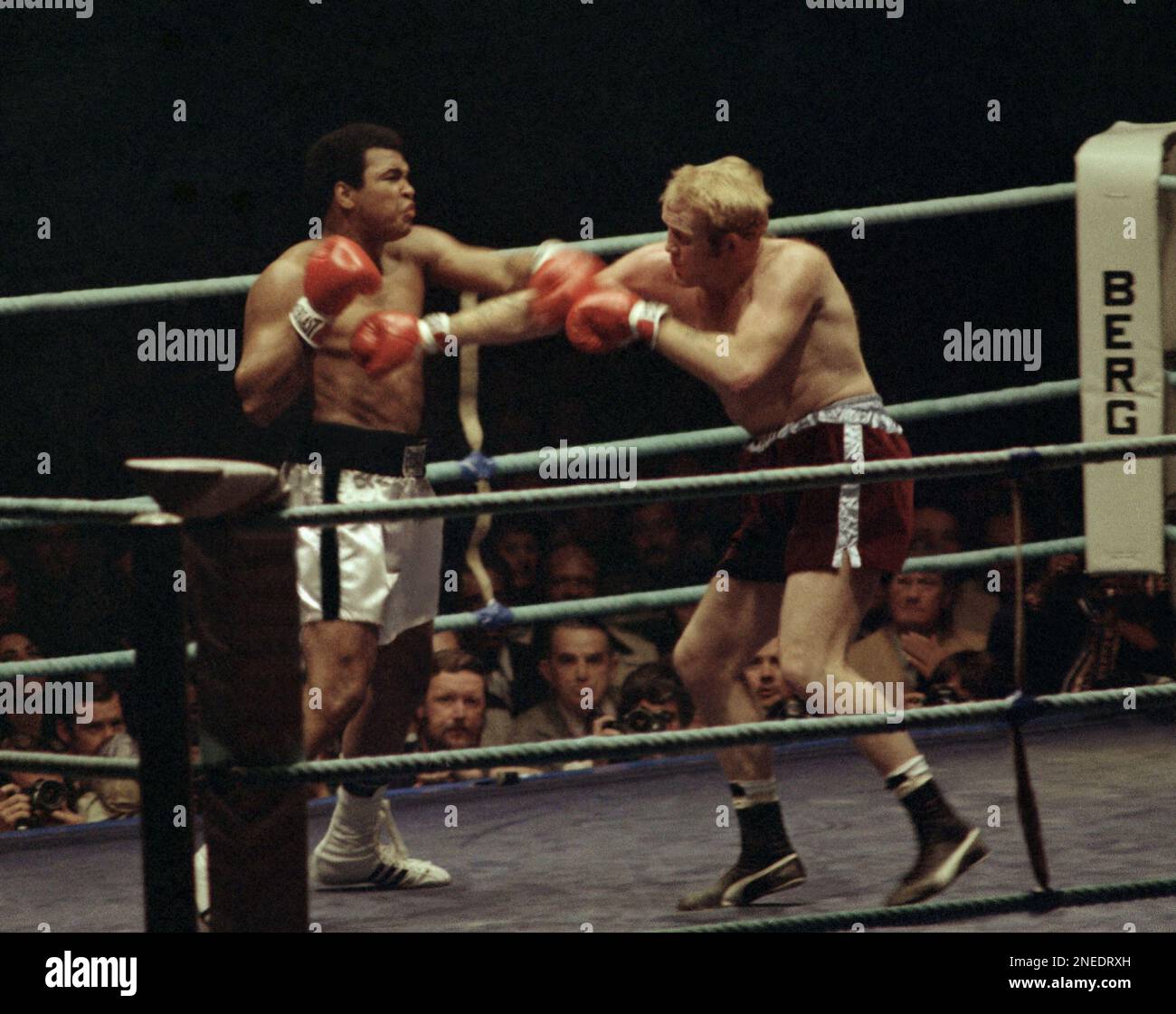 Richard Dunn and Muhammad Ali are shown in action during their fight in ...