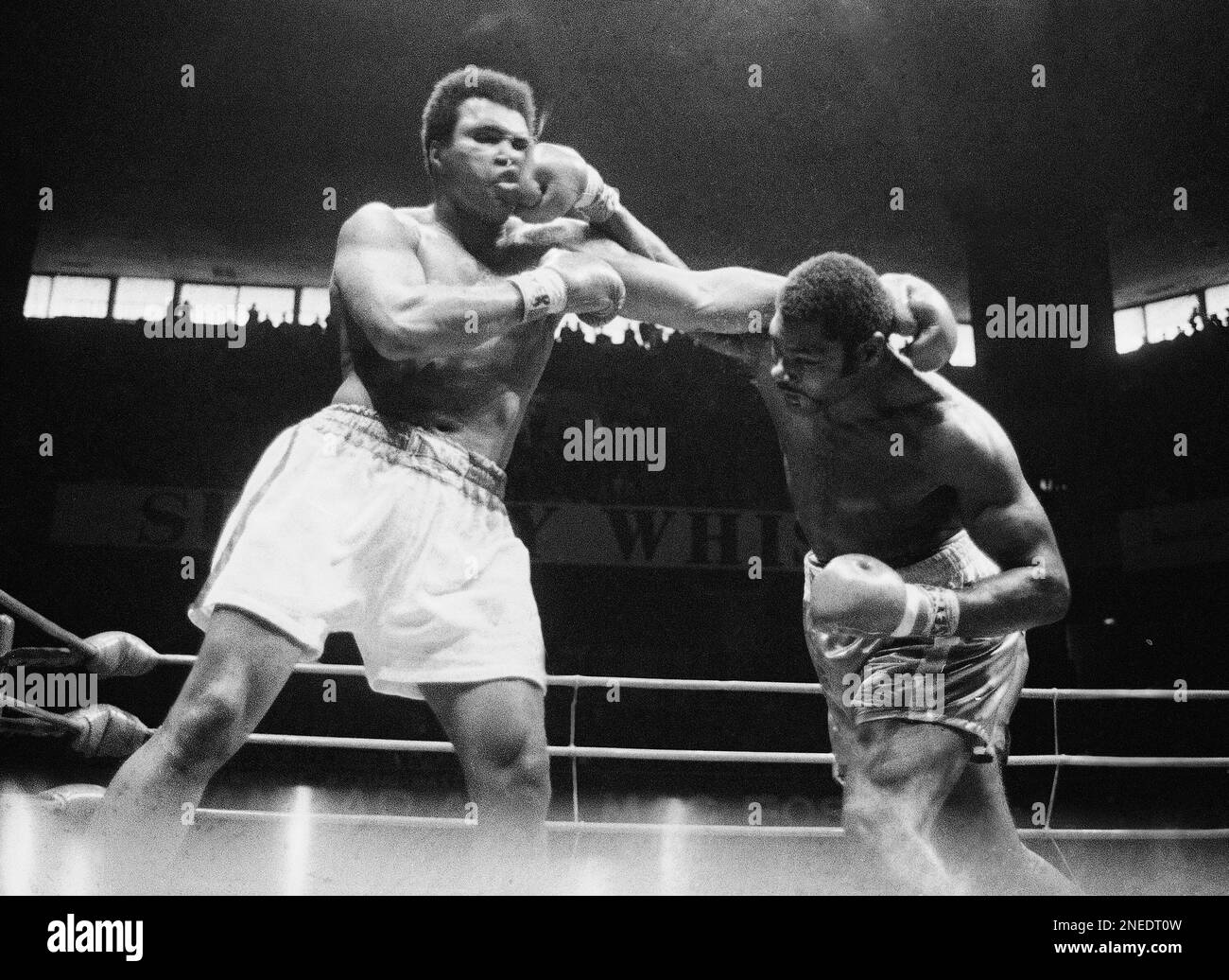 Bob Foster lands his right on Muhammad Ali's face in the third round on ...