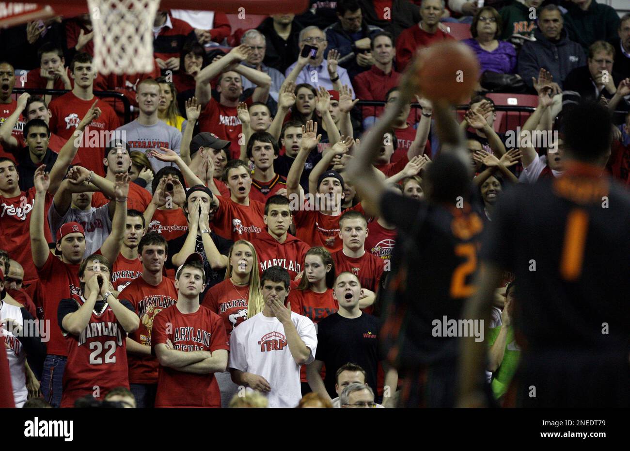 Maryland fans try and distract a Miami player shooting a free throw ...