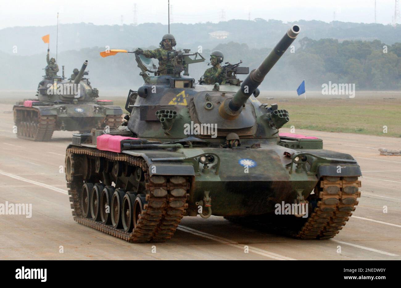Taiwanese military personnel display CM-11(M48H) tanks during a media ...