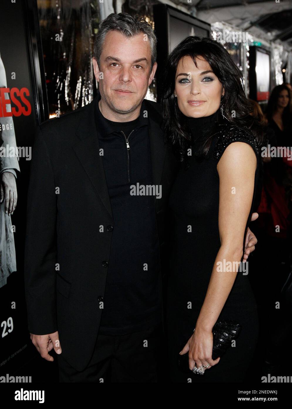 Cast member Danny Huston, left, and Lyne Renee arrive at the premiere ...