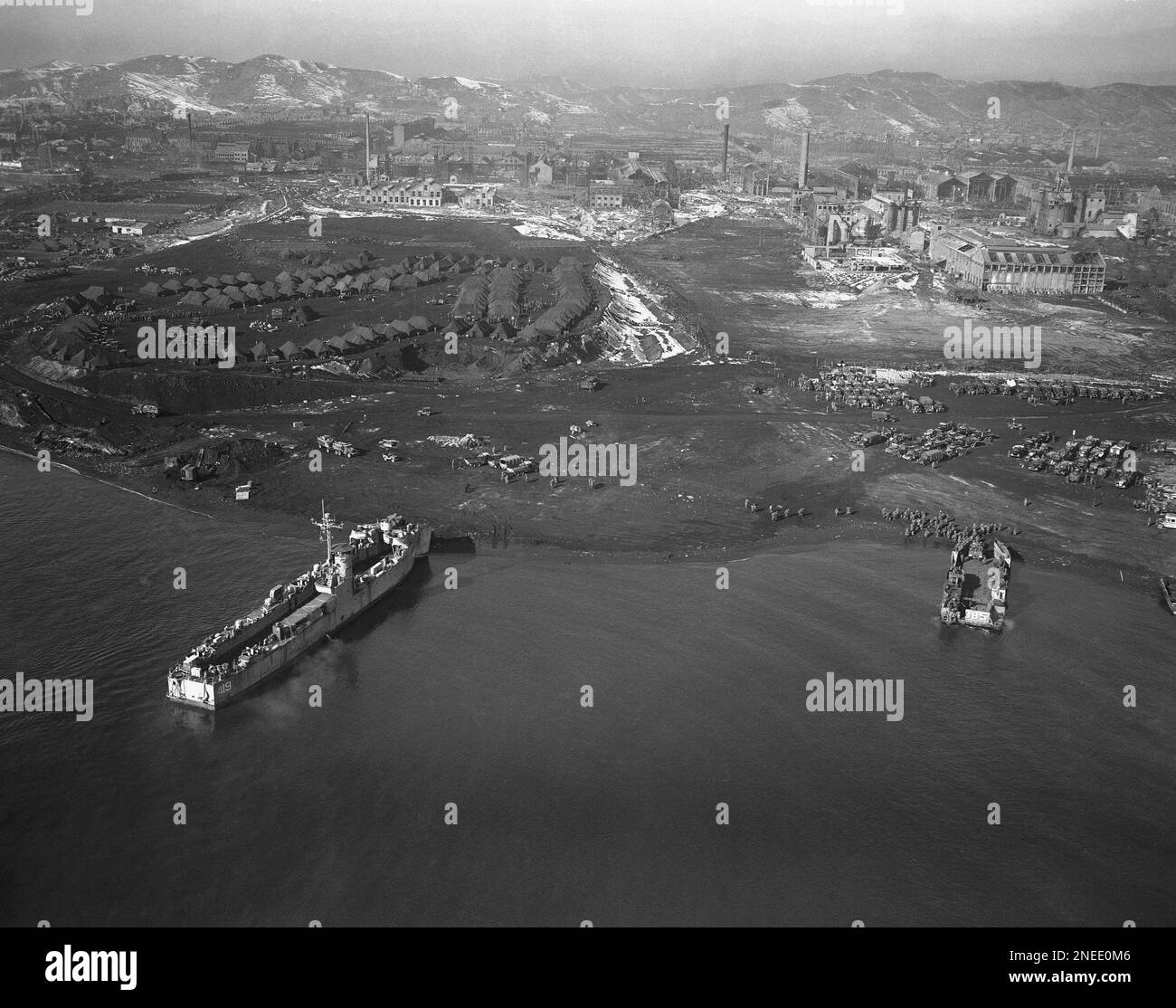 A landing craft is nosed into North Korean shore to pick up U.N ...
