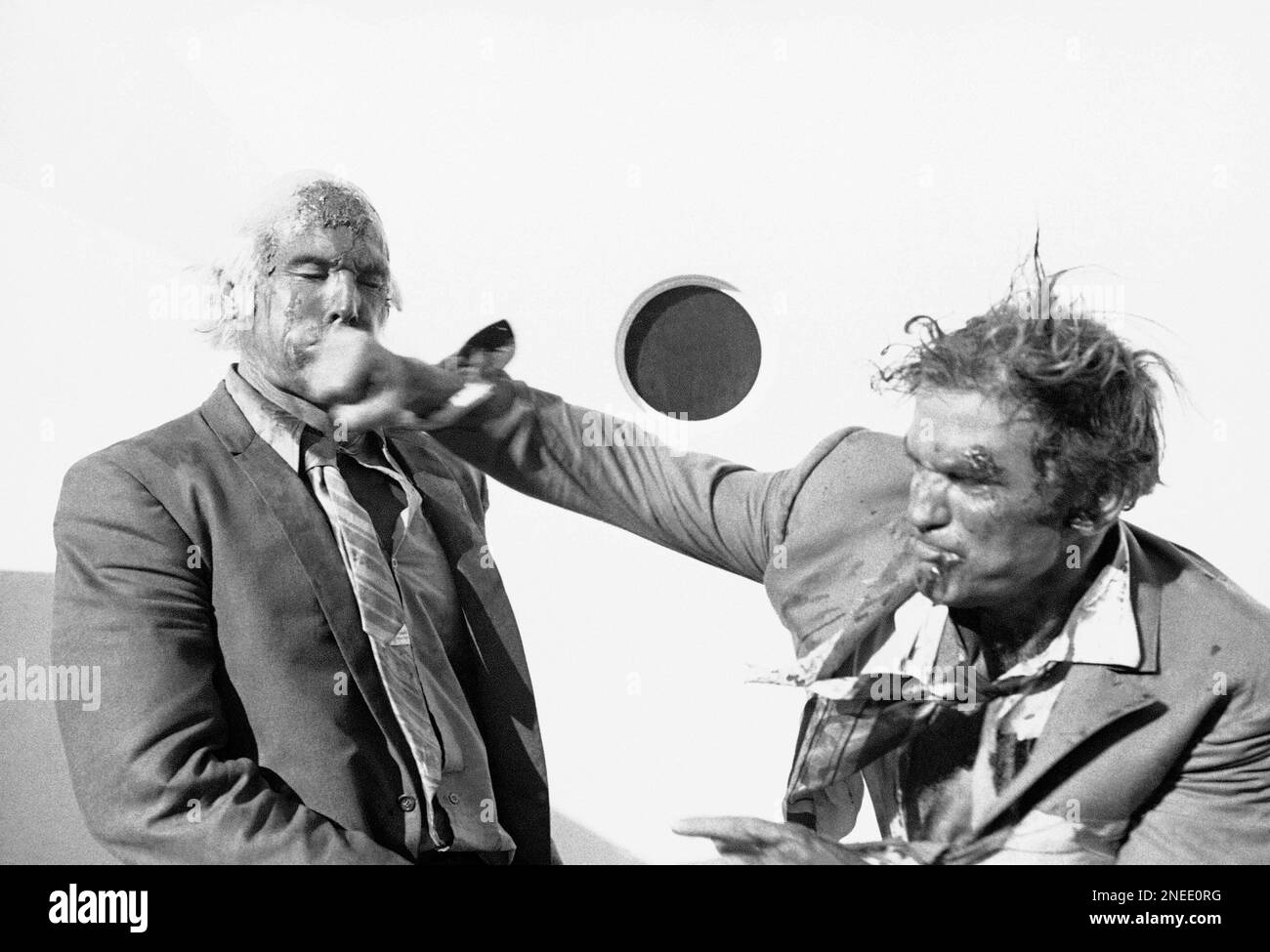Actors Rod Taylor, right, and William Smith engage in a ferocious fist fight aboard a ship while ...