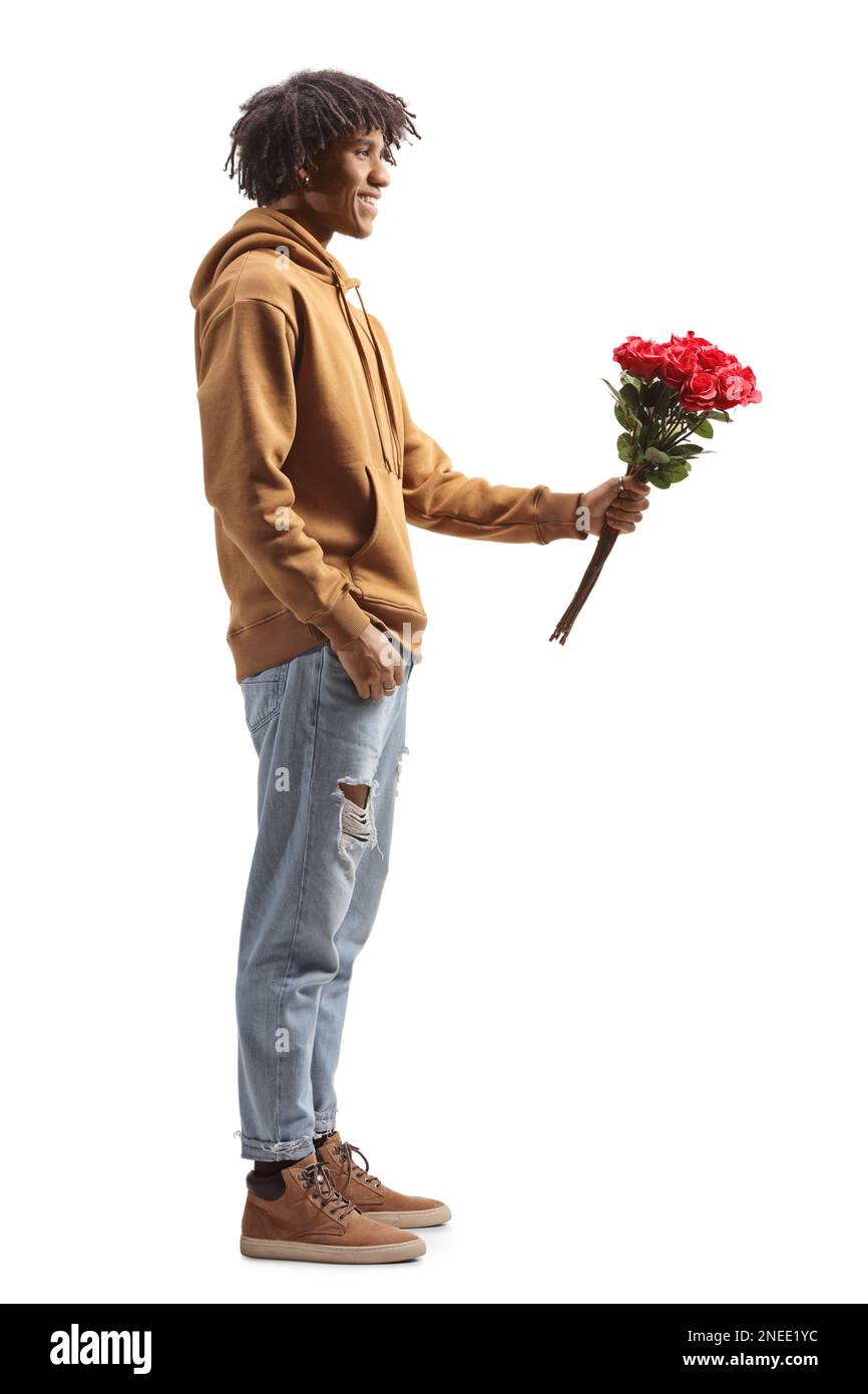 Full length profile shot of a young african american man giving a bunch ...
