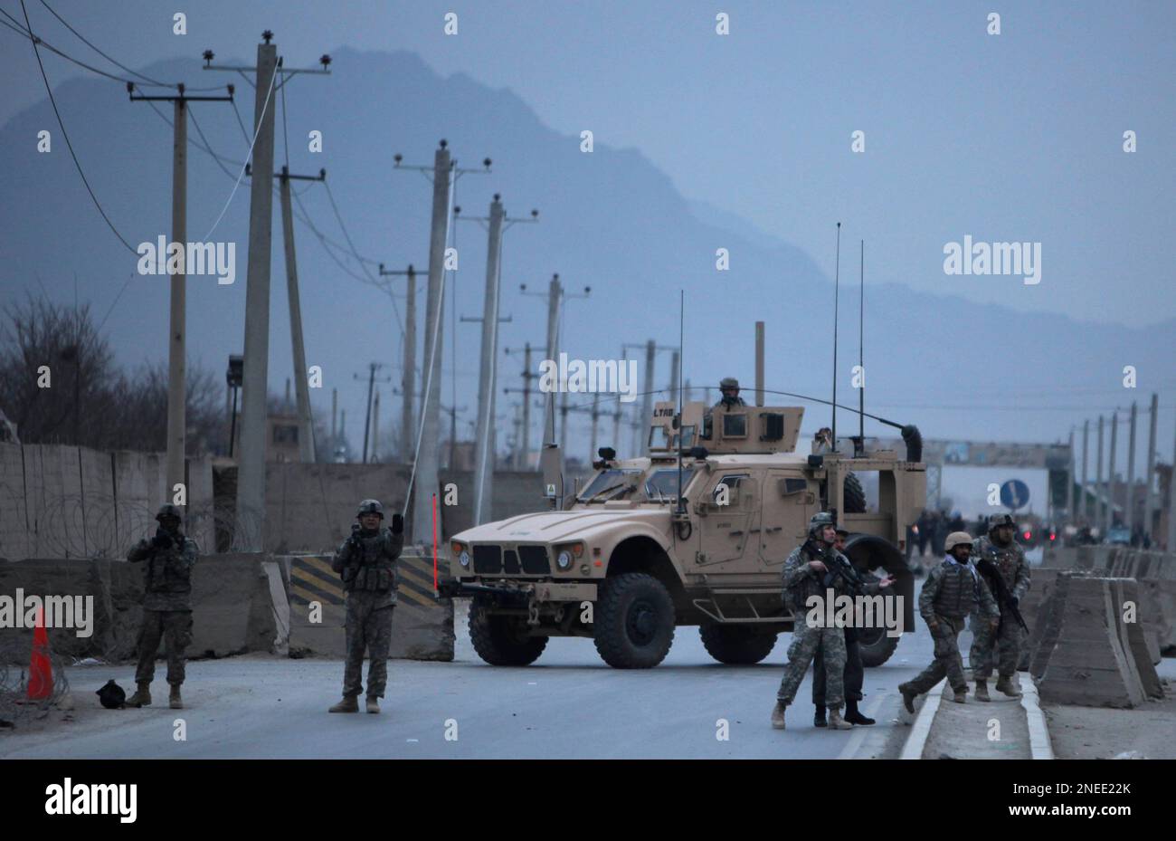 US soldiers secure the site of an explosion in Kabul, Afghanistan ...