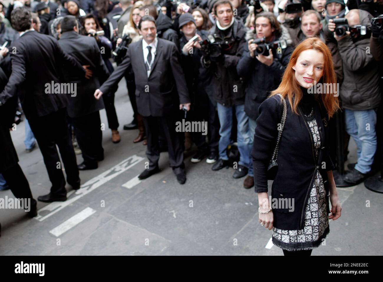 French actress Audrey Marney, right, arrives at the Chanel Spring ...