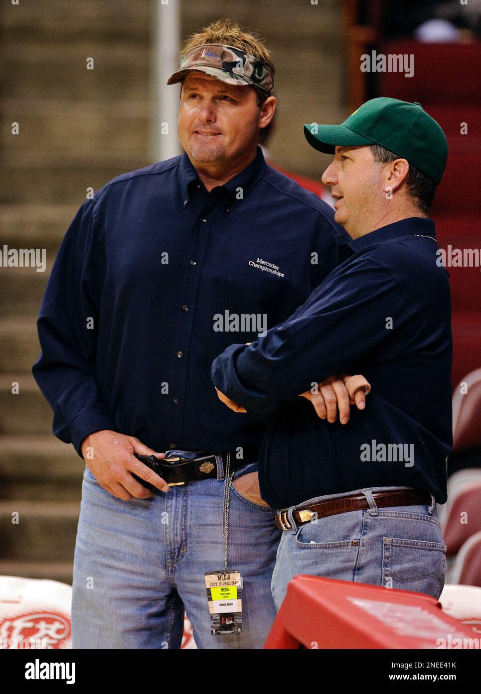 Former MLB pitcher Roger Clemens, left, talks with Brett Conrad, right ...