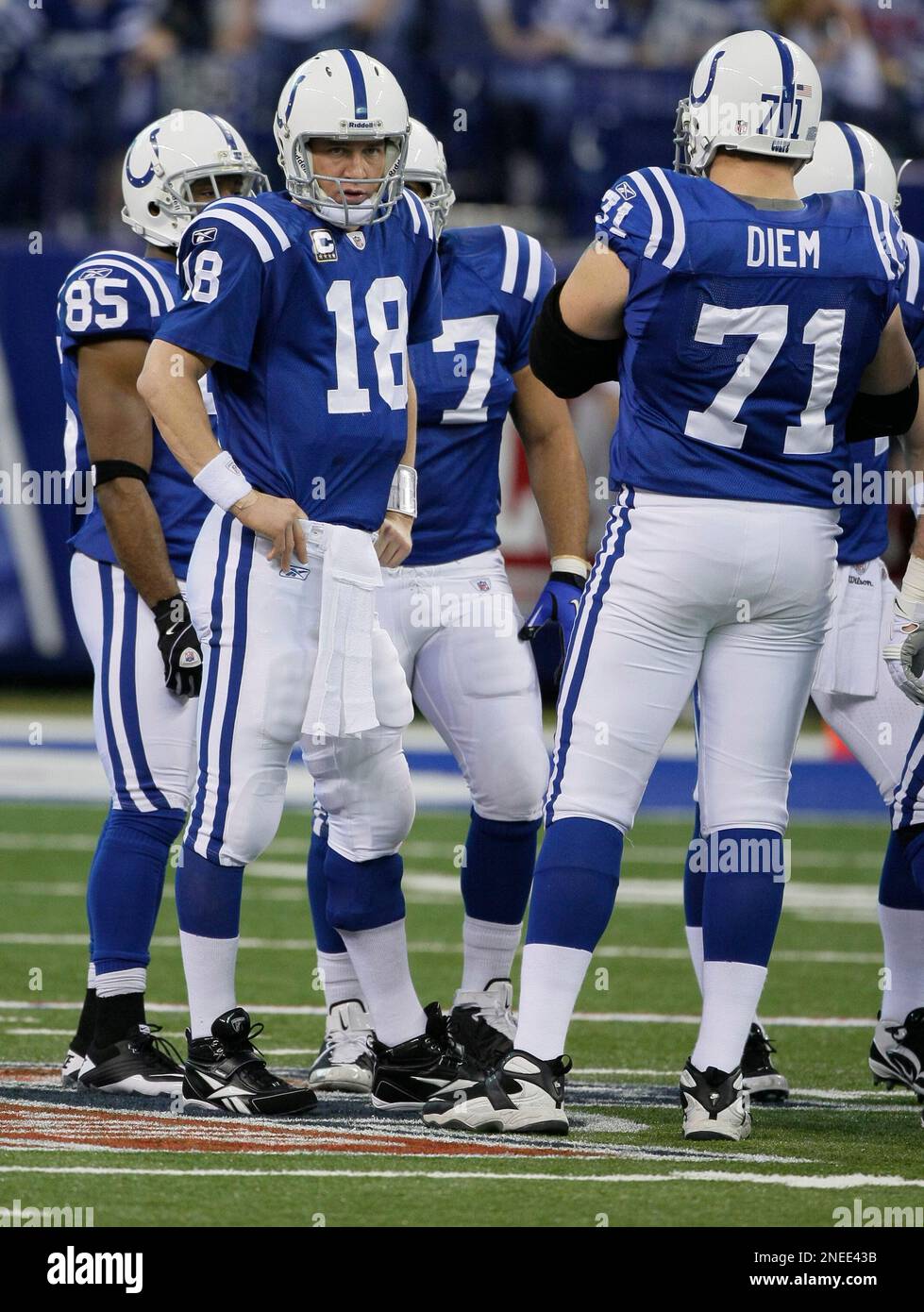 Indianapolis Colts quarterback Peyton Manning looks back at the bench ...