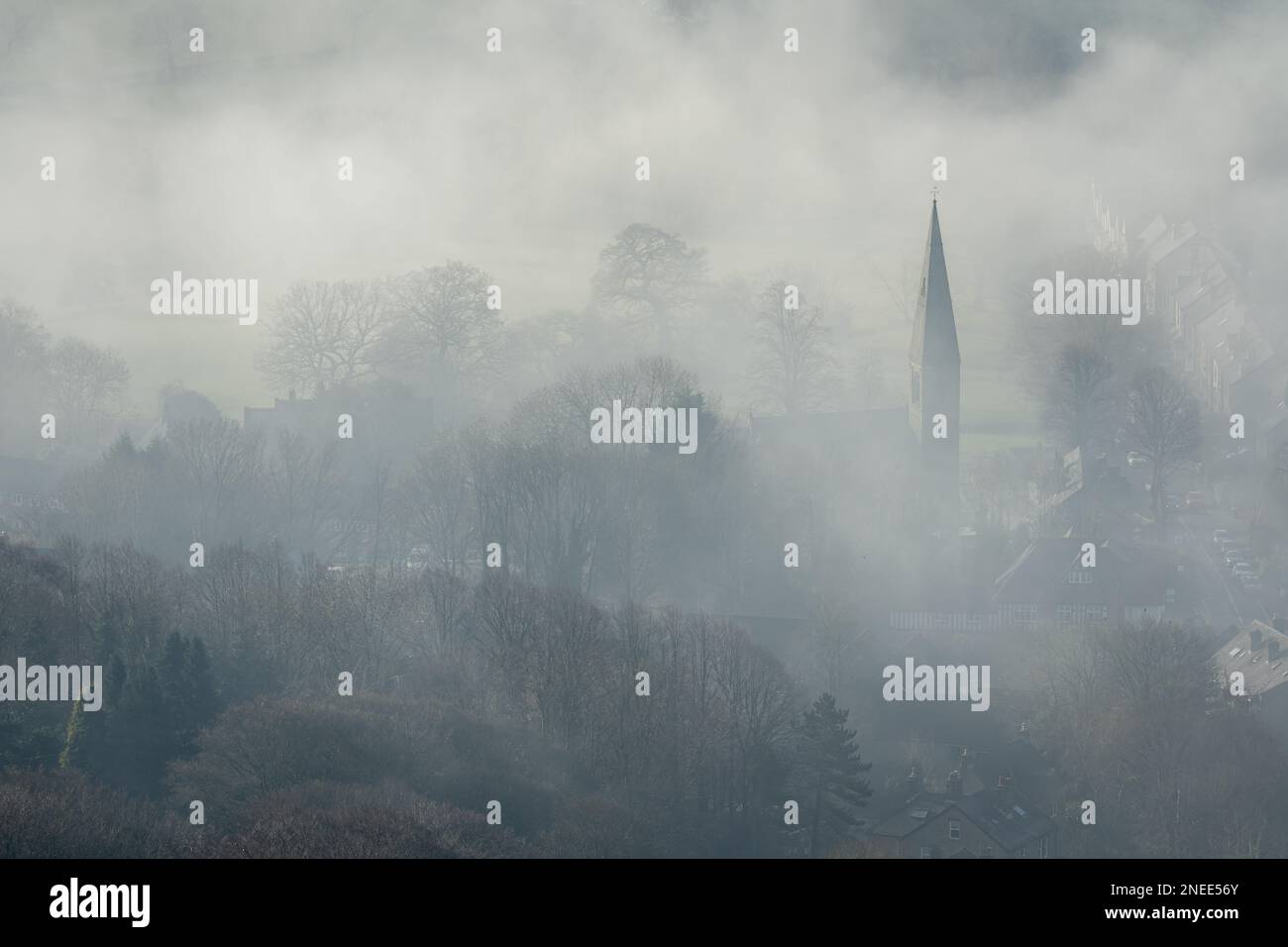 Trees, and mist. Bamford Edge landscape vignette during a winter ...