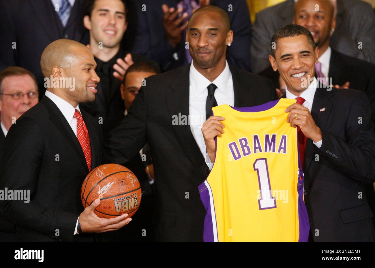 President Barack Obama, standing with Los Angeles Lakers guards Kobe ...