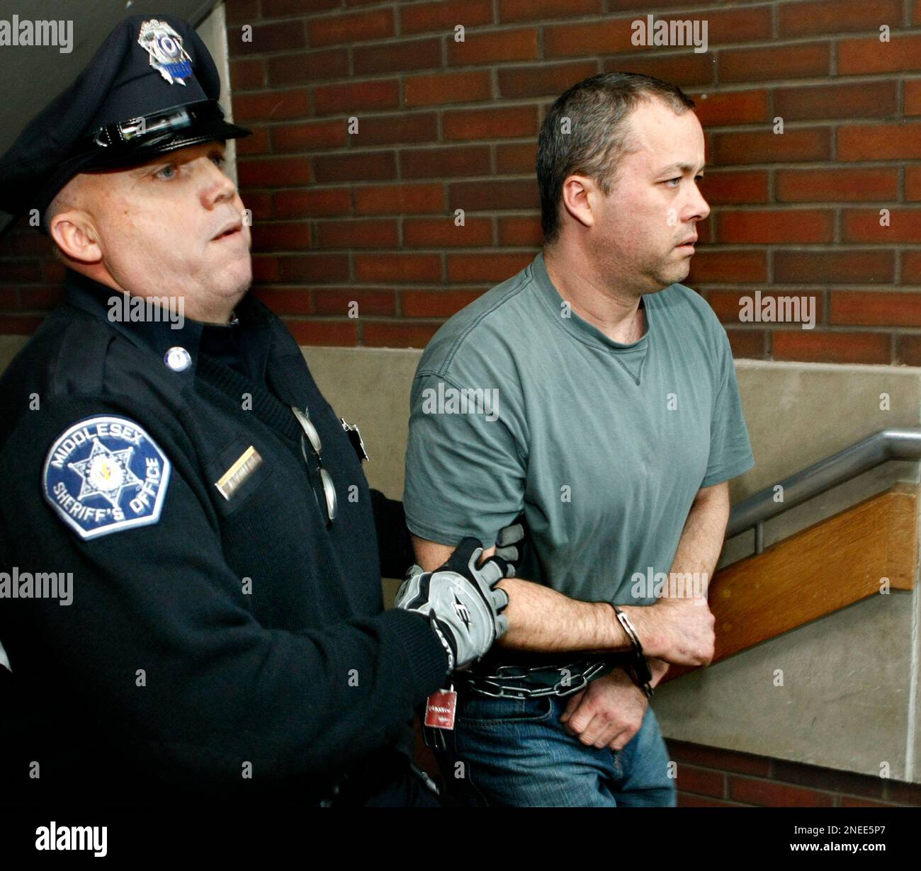 Mark Kerrigan, 45, the brother of figure skater Nancy Kerrigan, is led ...