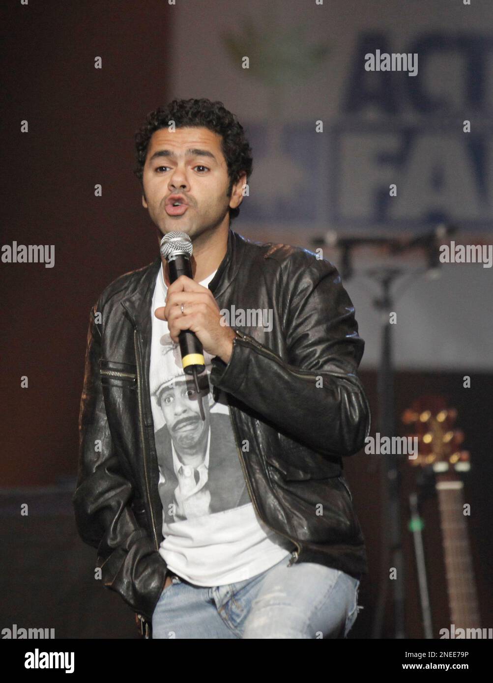 French comic Djamel Debbouze performs during a charity concert for ...